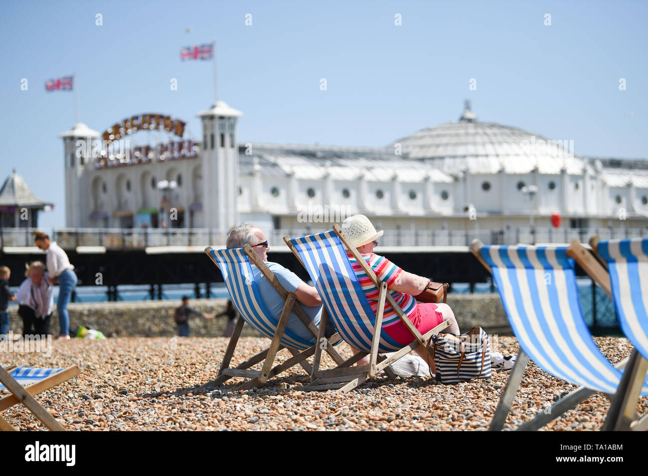 Brighton UK 21st May 2019 - Visitors enjoy the warm sunny weather on ...