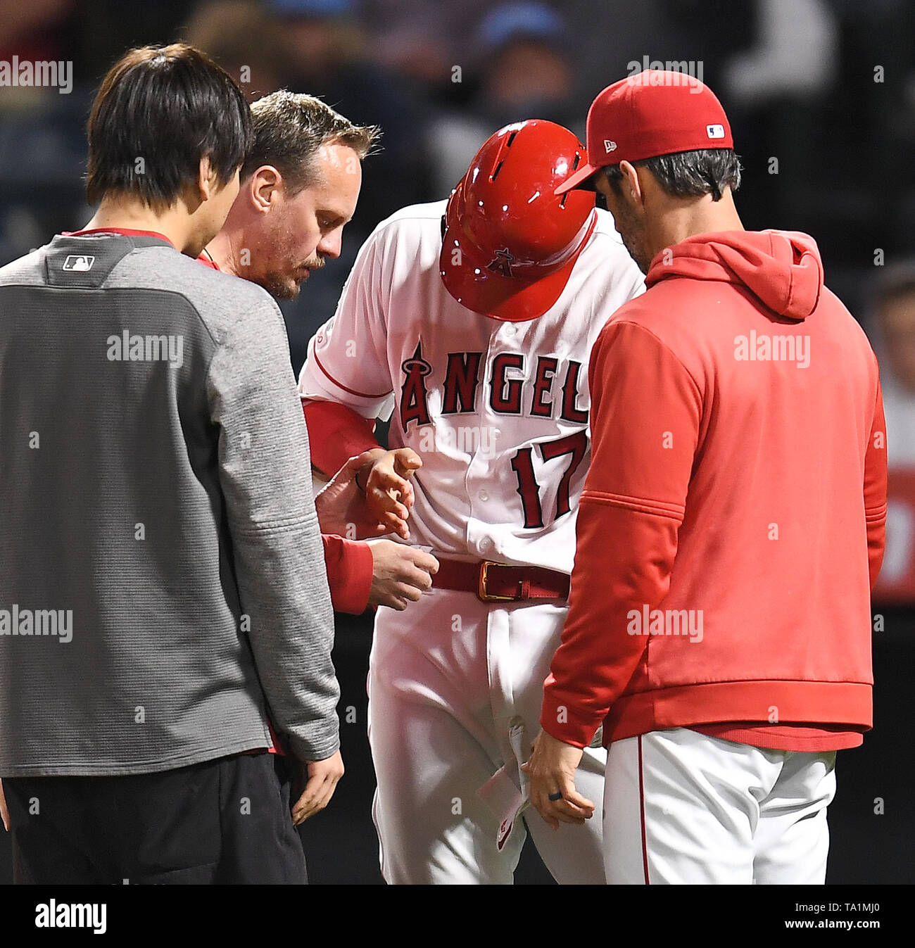 Los Angeles Angels designated hitter Shohei Ohtani is checked by team ...