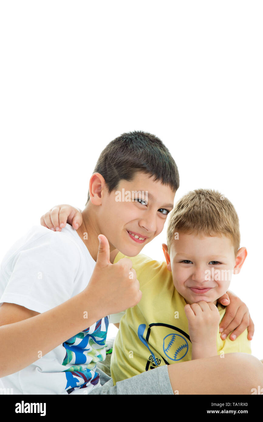 Two happy joyful and loving brothers isolated on white background ...