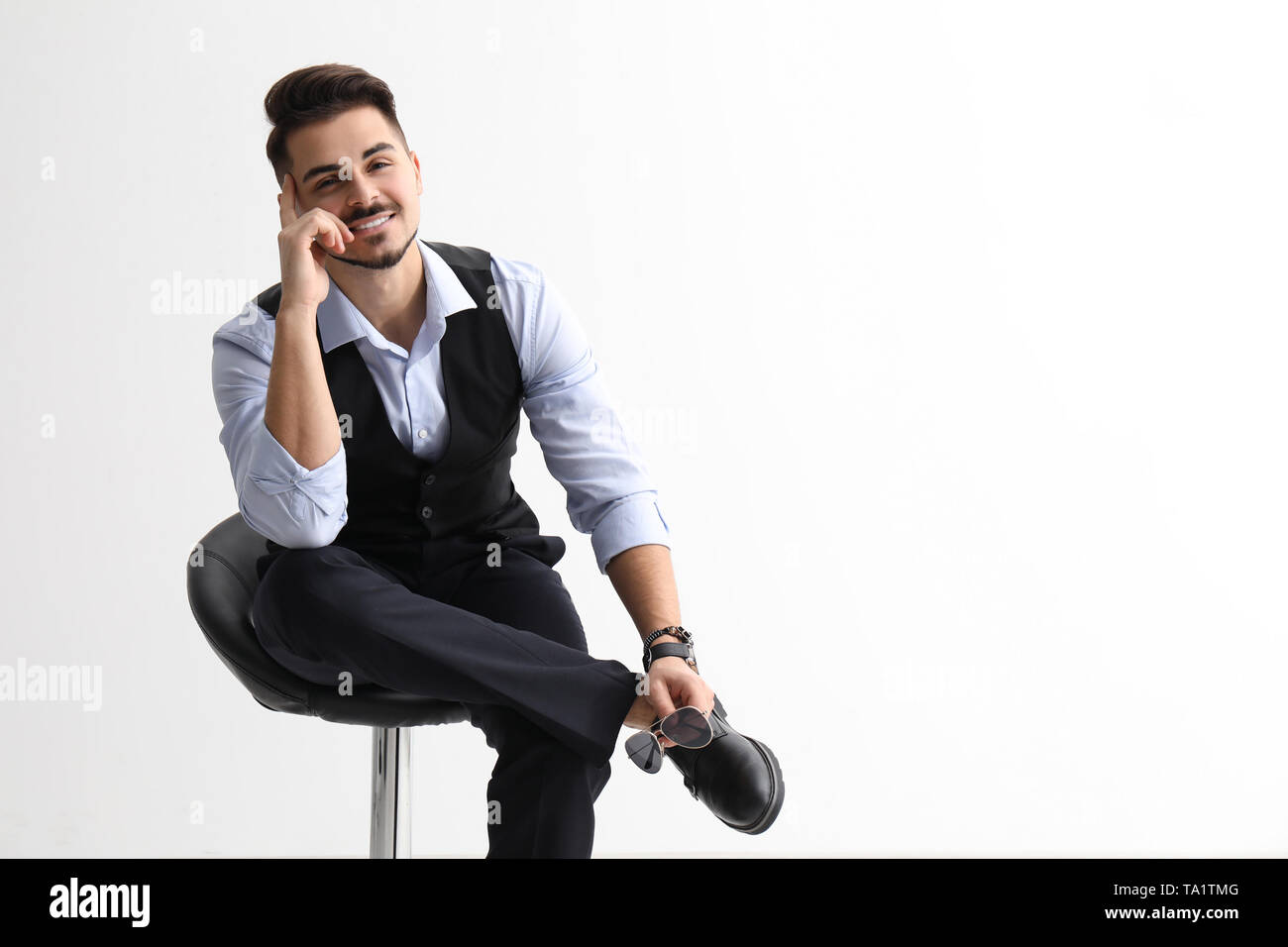 Stylish handsome man on white background Stock Photo - Alamy