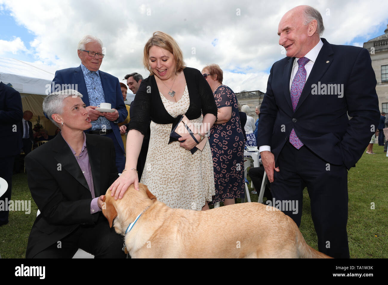 Northern Ireland Secretary Karen Bradley meets guide dog Morris with ...
