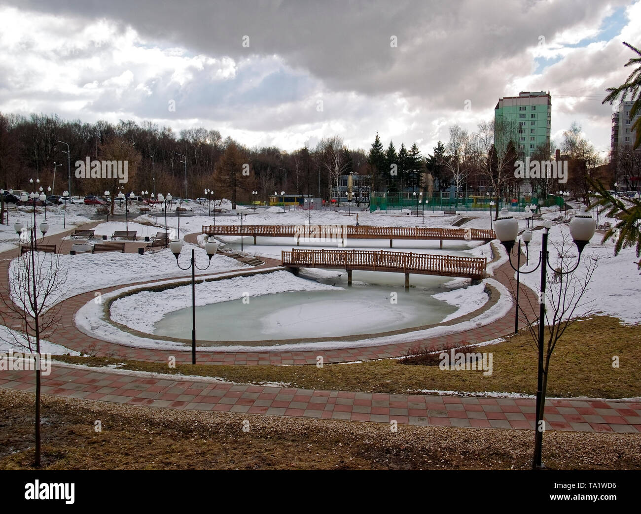 the pond ice is still melting in spring, Moscow Stock Photo - Alamy