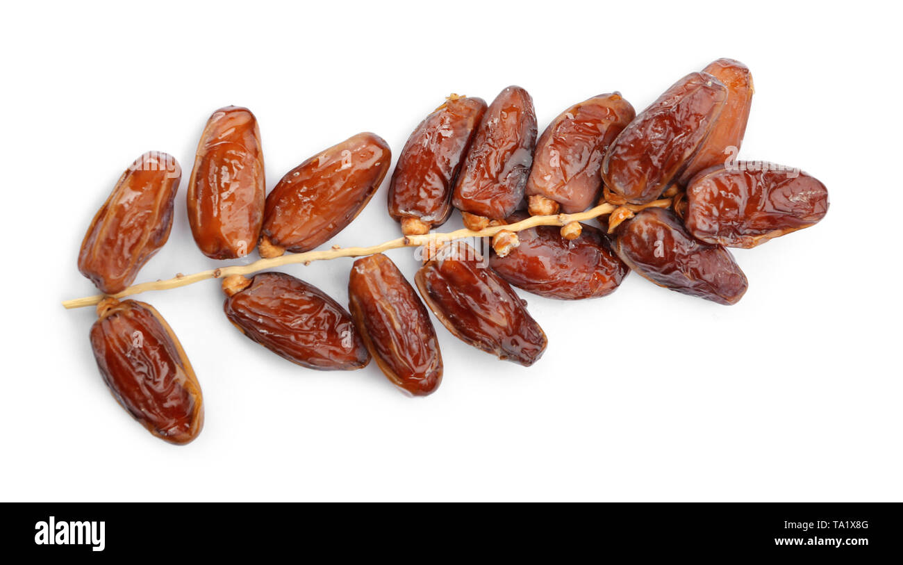 Sweet dried dates on white background Stock Photo - Alamy