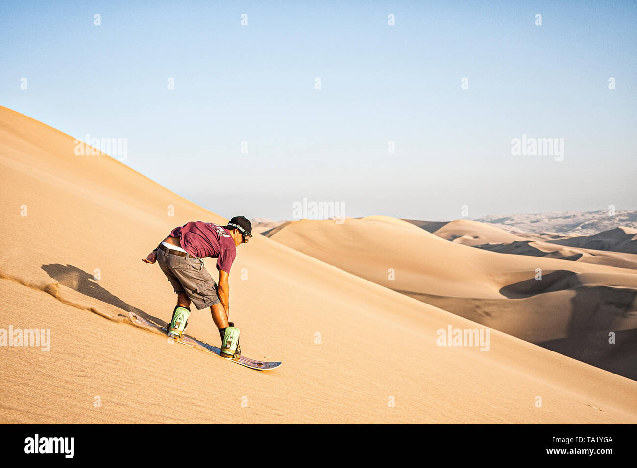 Sandboarding on Huacachina Desert. Ica, Department of Ica, Peru Stock ...