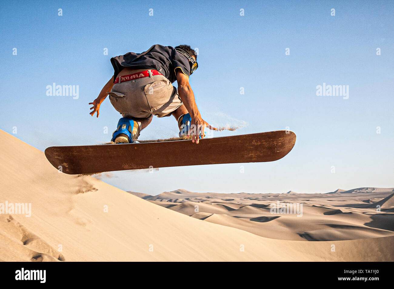 Sandboarding on Huacachina Desert. Ica, Department of Ica, Peru Stock ...