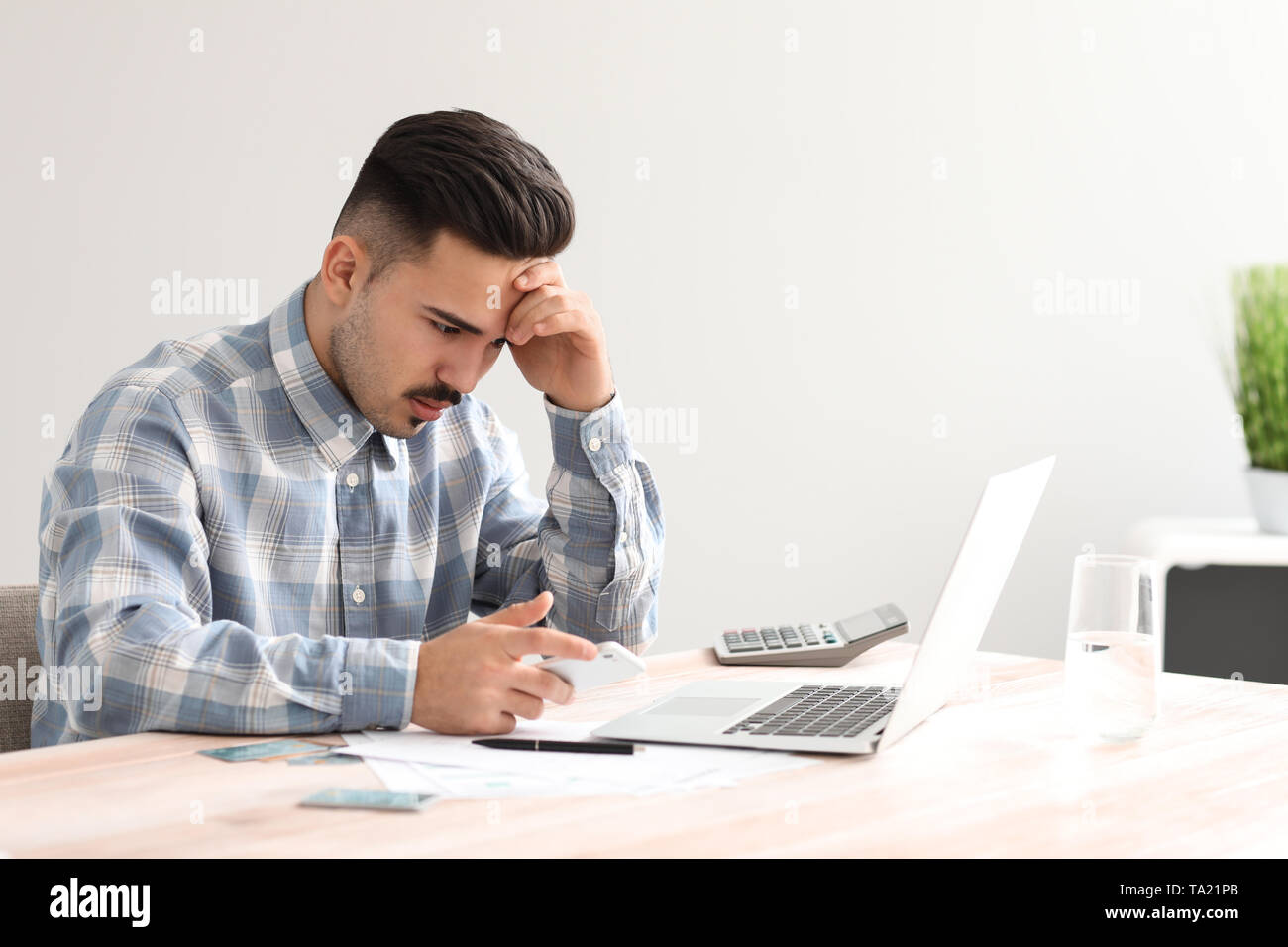 Sad phone poverty hi-res stock photography and images - Alamy