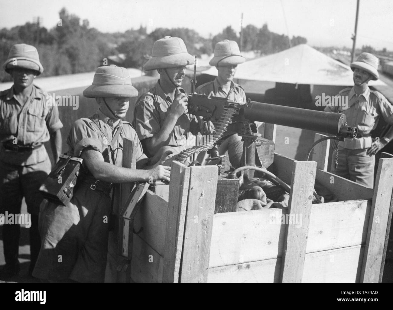 1930s: British soldiers fighting the Arab revolt with a machine gun ...
