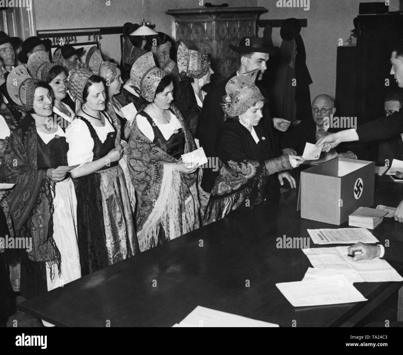 After the invasion of the German troops in Austria a referendum is ...