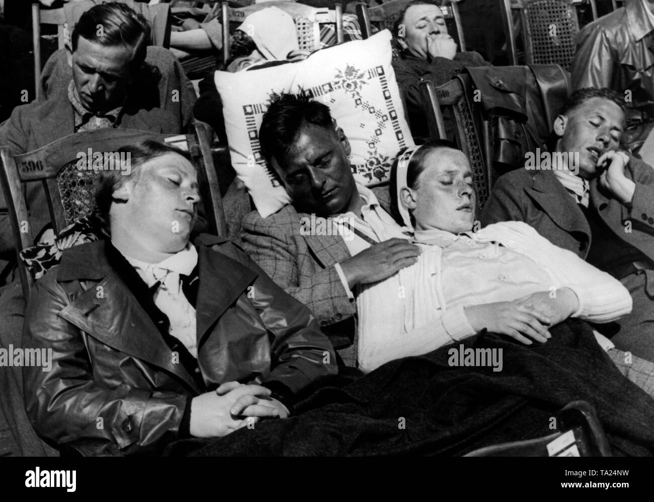 Vacationers are sunbathing on board a cruise ship of the Nazi ...