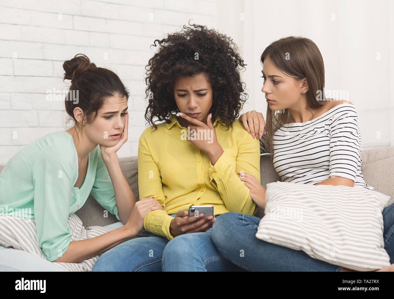Two friends chat home unhappy hi-res stock photography and images - Alamy