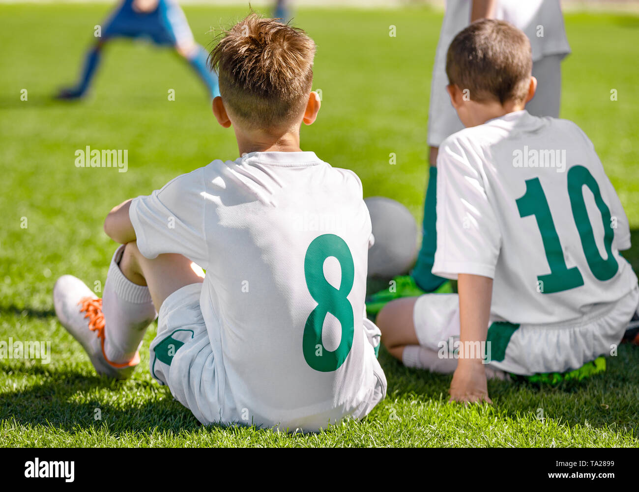 Two Football Boys in White Jersey Football Kit Stock Photo - Alamy