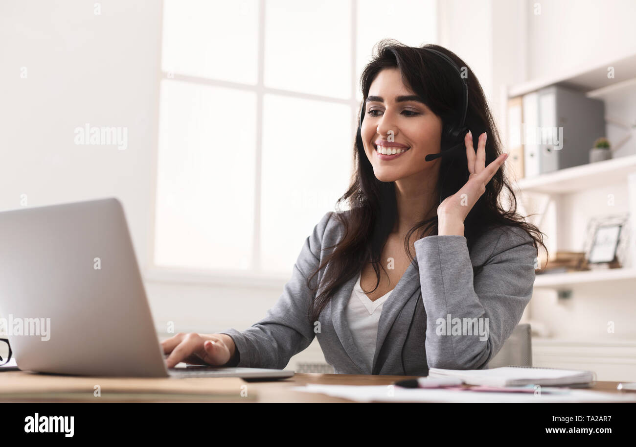 Work In Callcenter. Female Secretary With Headset Stock Photo - Alamy