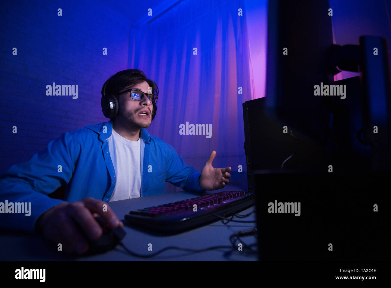 Aggressive gamer virtual reality hi-res stock photography and images ...