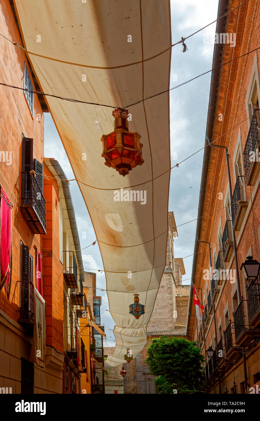outdoor overhead canopy, tied to buildings, decorative lanterns, annual ...