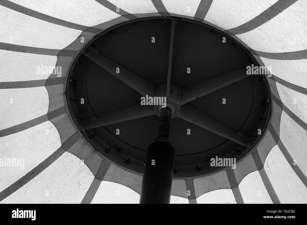 Low angle close-up view of metal construction and the roof of a large ...