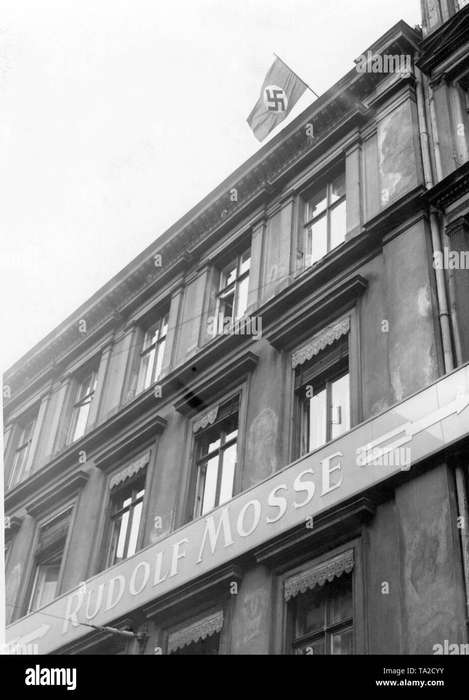 On the occasion of the Reichstag election, a swastika flag is blowing ...