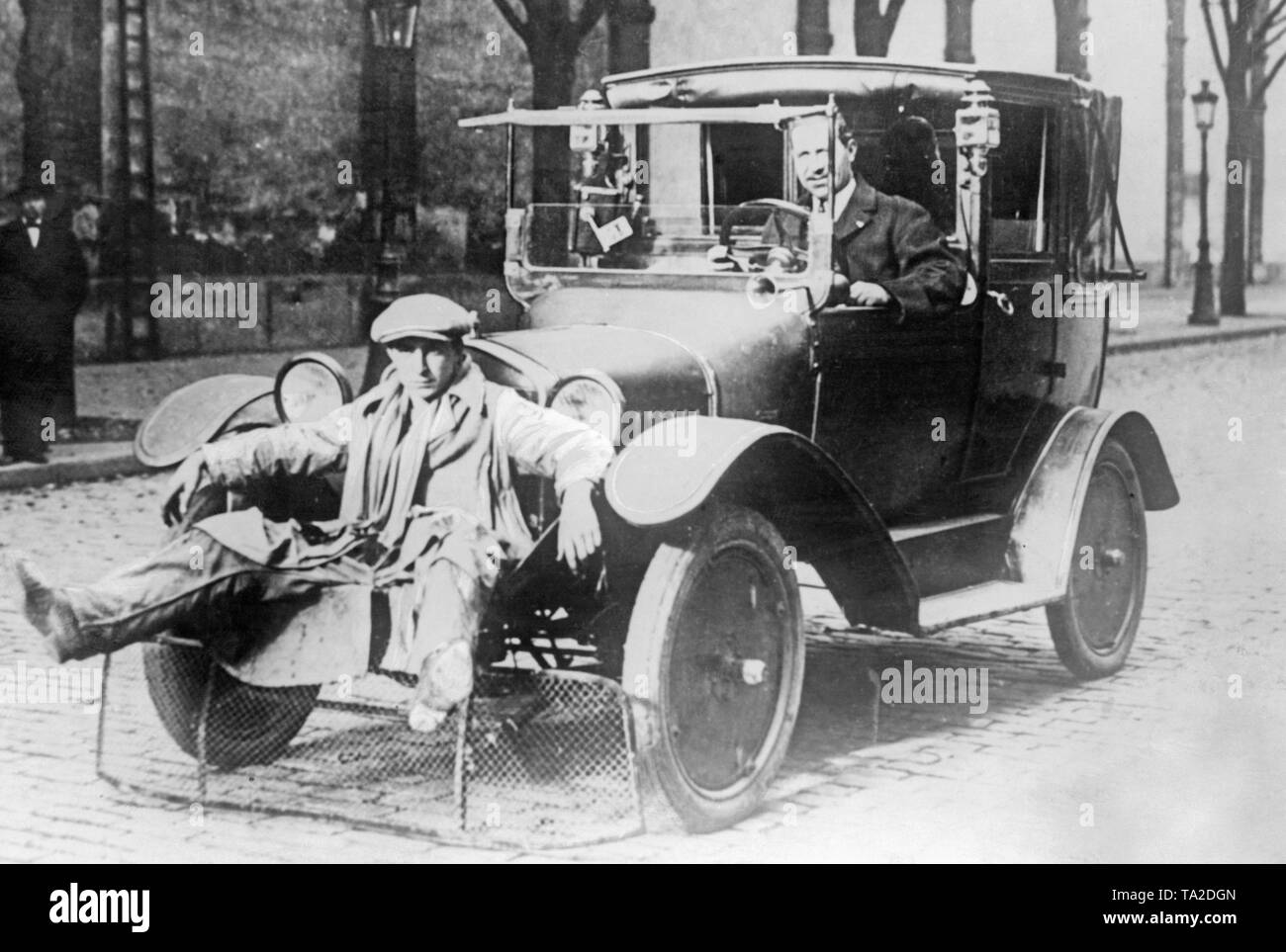 A wire mesh below the front bumper is designed to prevent a pedestrian ...
