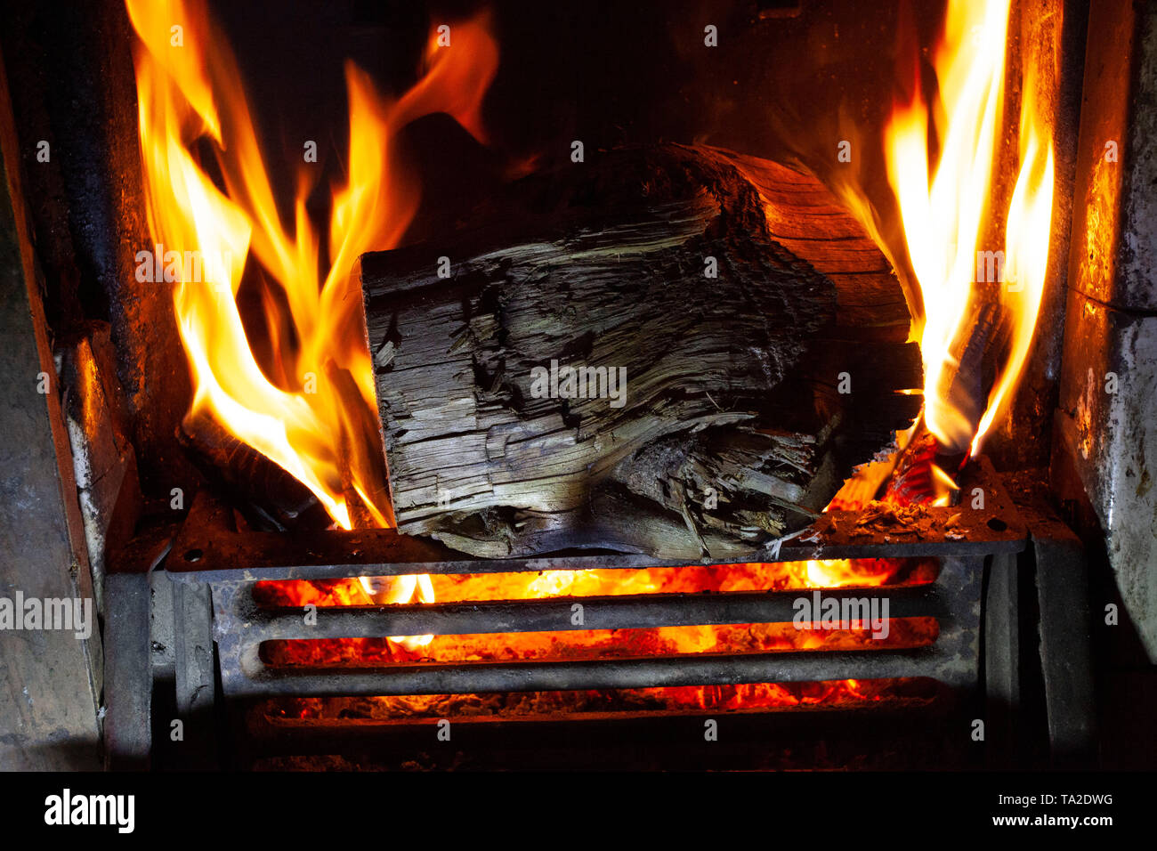 Home Fire Pine Log Stock Photo - Alamy