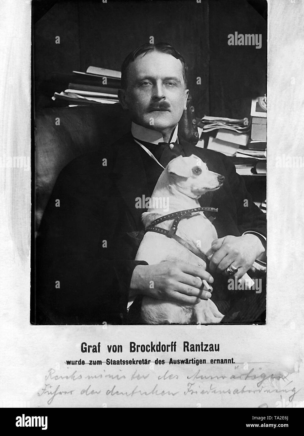 Count von Rantzau with his dog at his desk. The picture was reissued ...