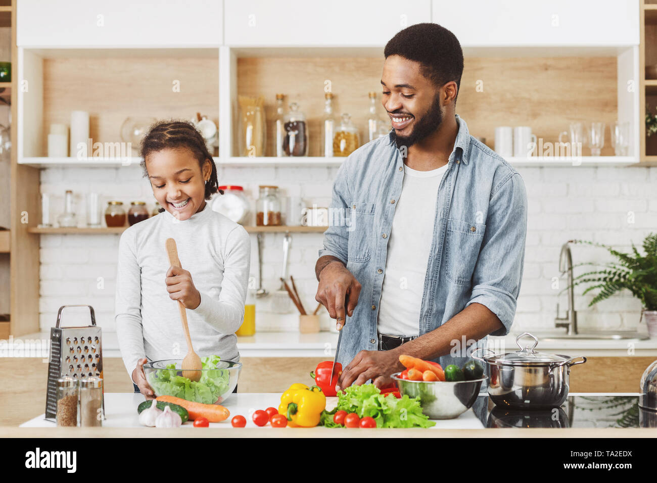 Cooking healthy food together concept Stock Photo - Alamy