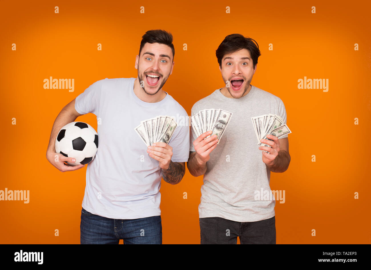Sports Betting. Excited Men Enjoying Their Win Stock Photo - Alamy