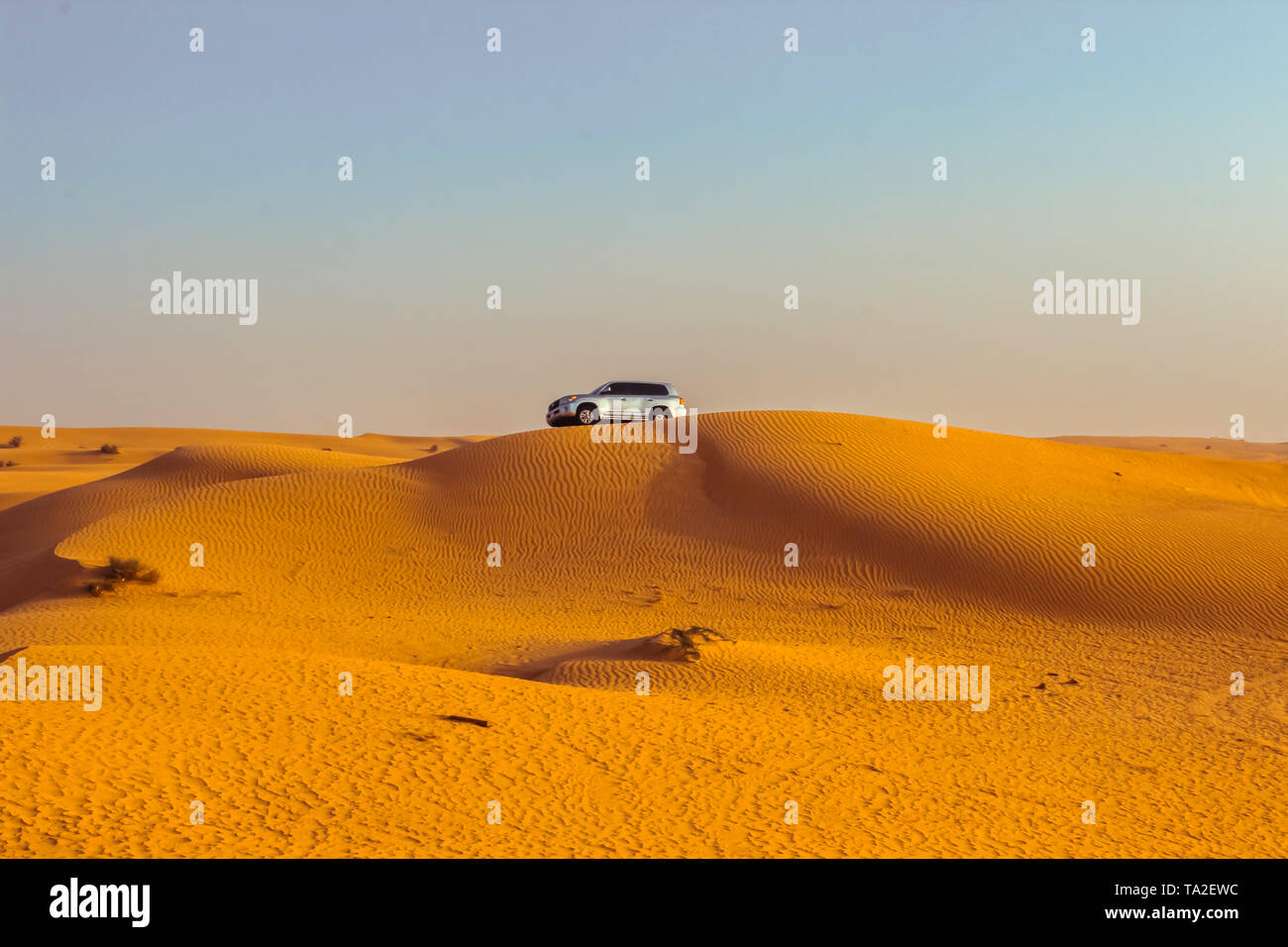 Jeep safari on sand dunes in Dubai desert Stock Photo - Alamy