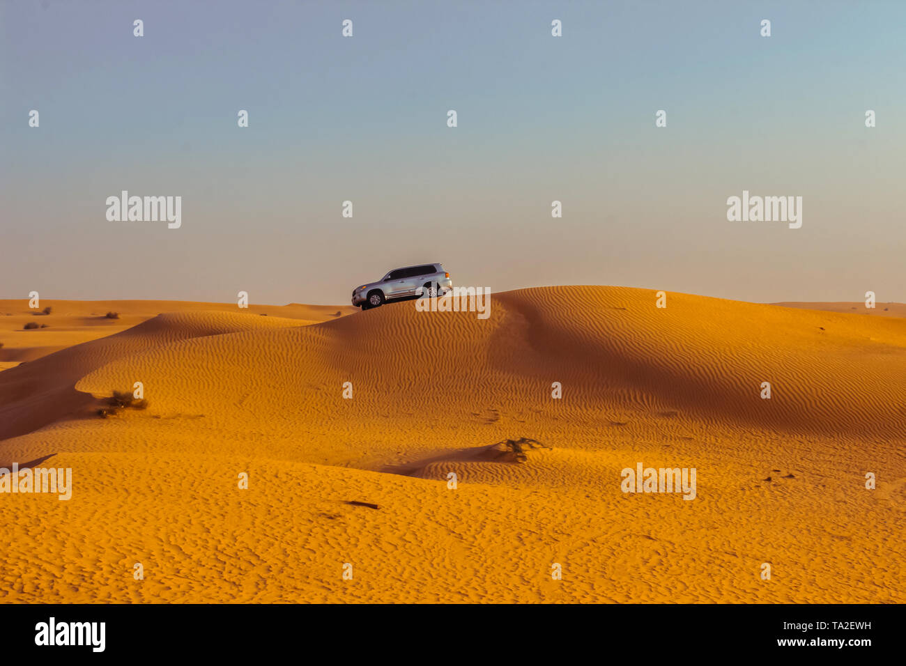 Jeep safari on sand dunes in Dubai desert Stock Photo - Alamy