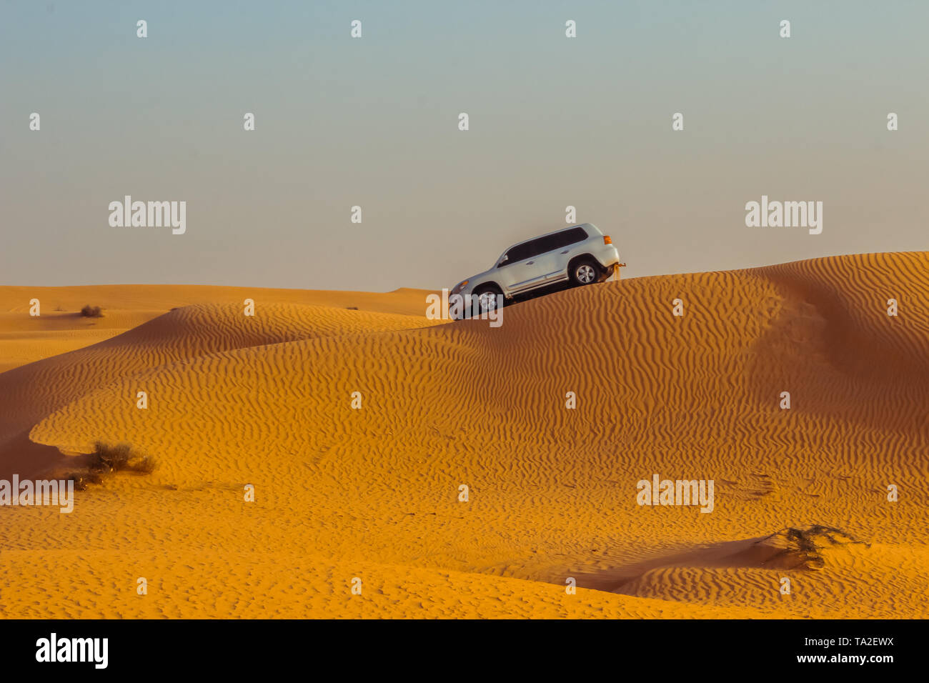 Jeep safari on sand dunes in Dubai desert Stock Photo - Alamy