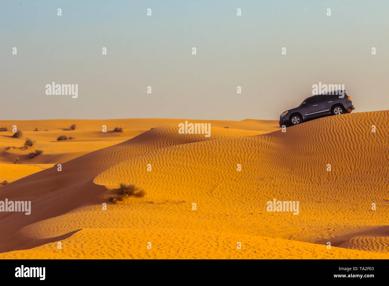 Jeep safari on sand dunes in Dubai desert Stock Photo - Alamy