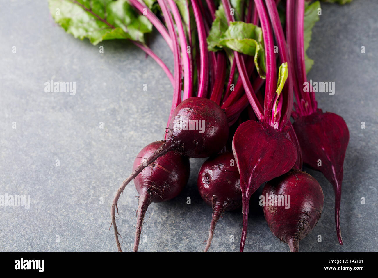 Fresh organic beet, beetroot. Grey background. Copy space. Top view ...