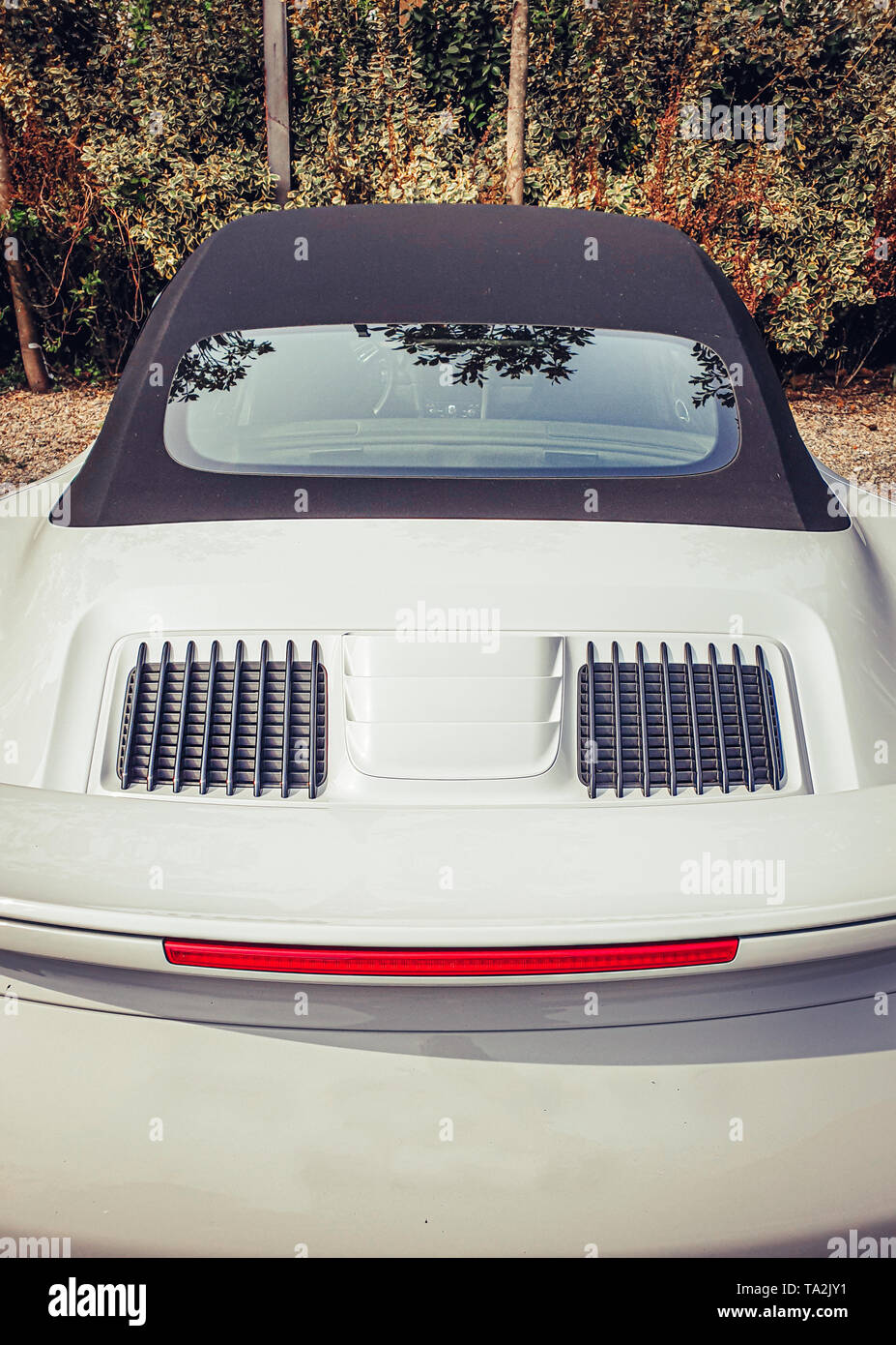 Image of rear view of white sportscar Stock Photo - Alamy