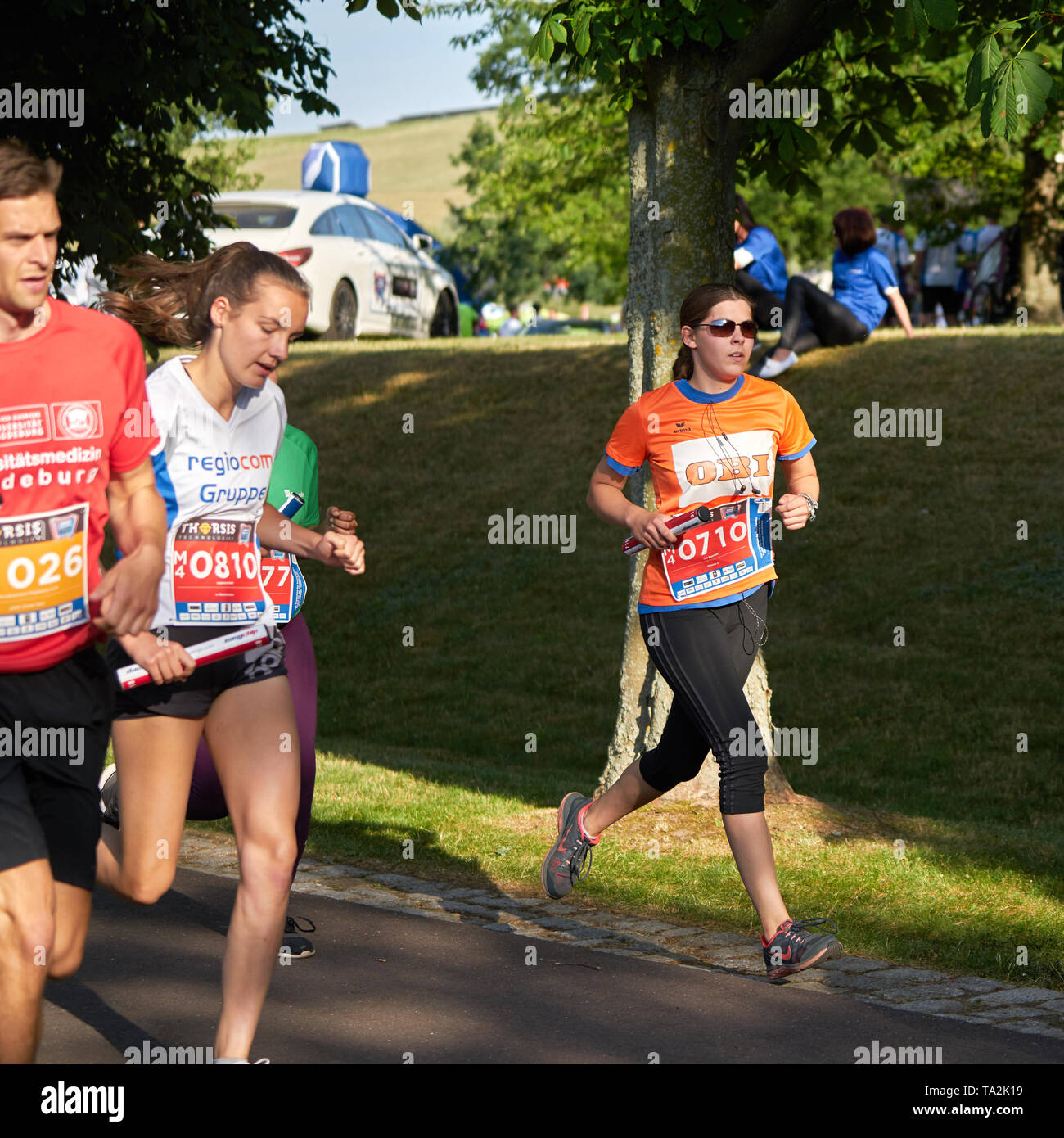 Employees jogging hi-res stock photography and images - Alamy