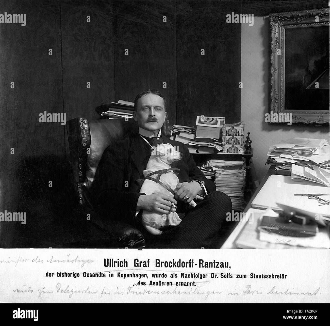 Count von Rantzau with his dog at his desk. The picture was reissued ...