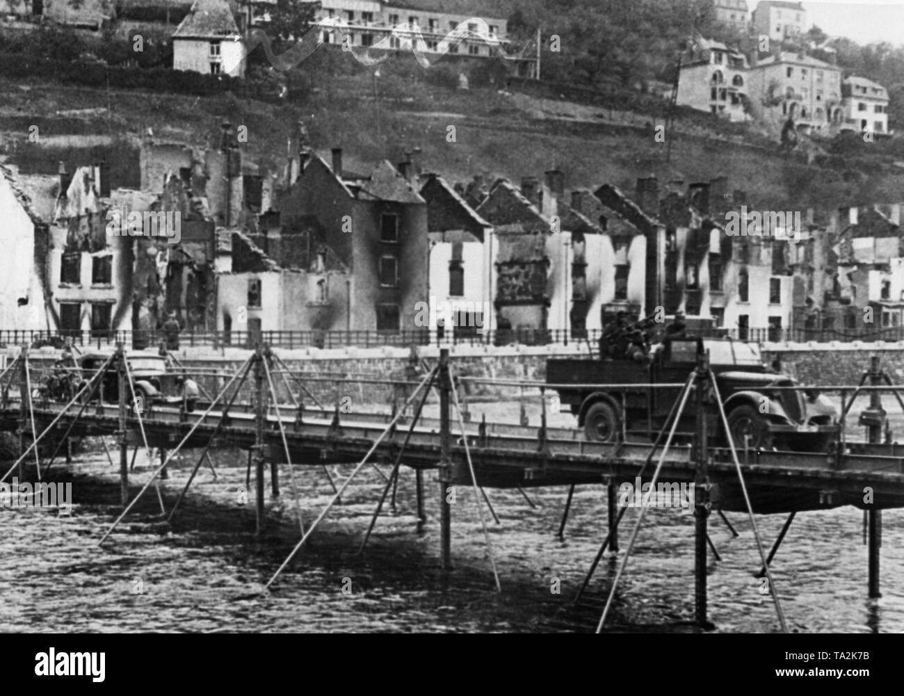 Pioneers of the Wehrmacht build a makeshift bridge on the place of the ...