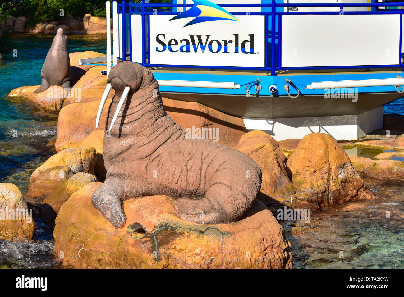 Orlando, Florida . February 26, 2019. Sealion statue and Seaworld sign ...