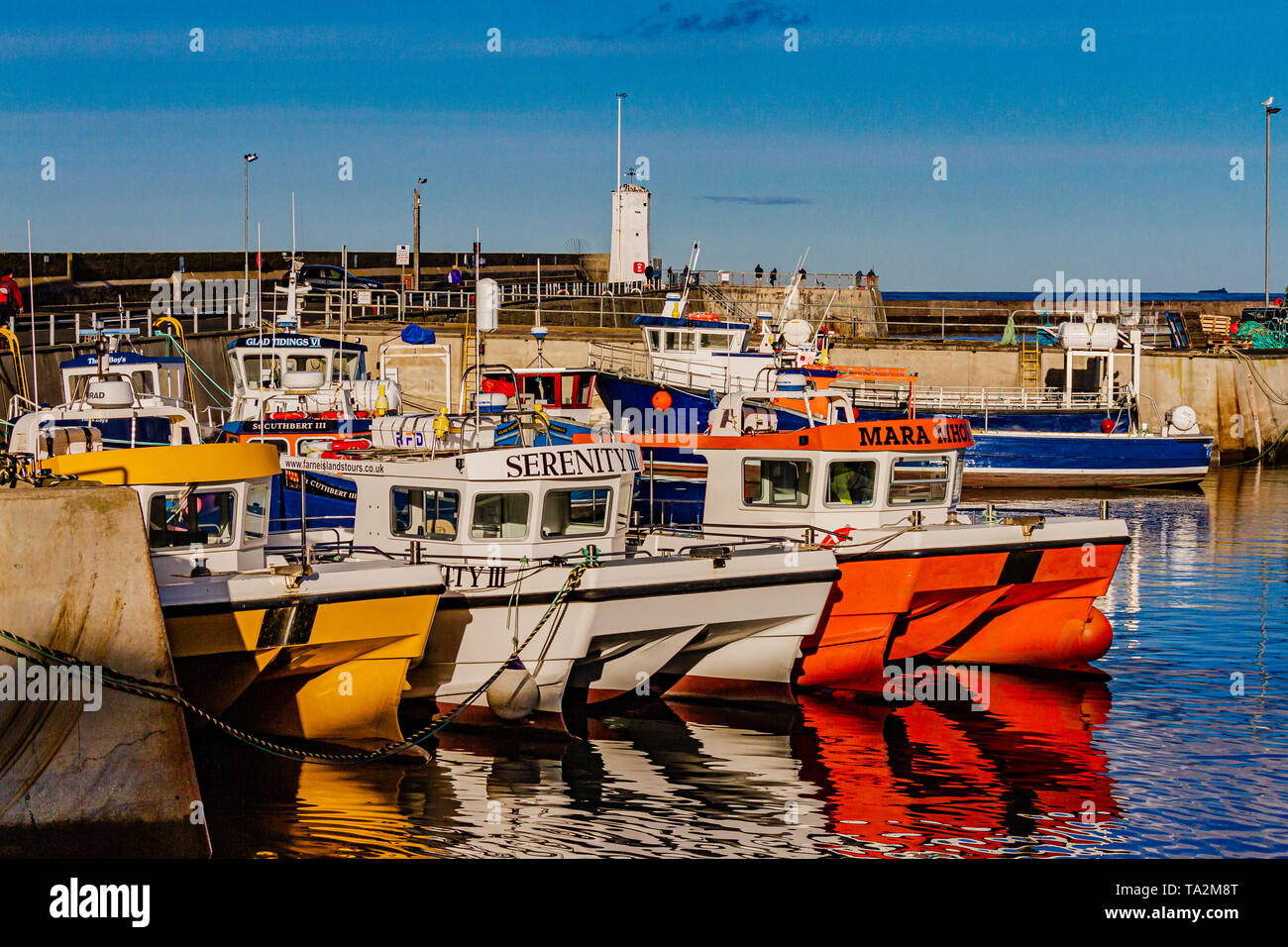 Boat fishing harbour seahouses hi-res stock photography and images - Alamy