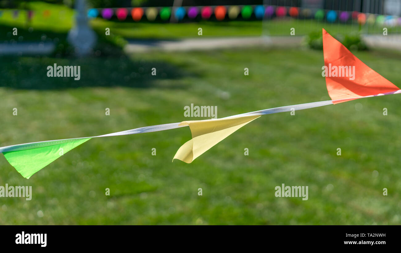 Triangular flags in wind hi-res stock photography and images - Alamy