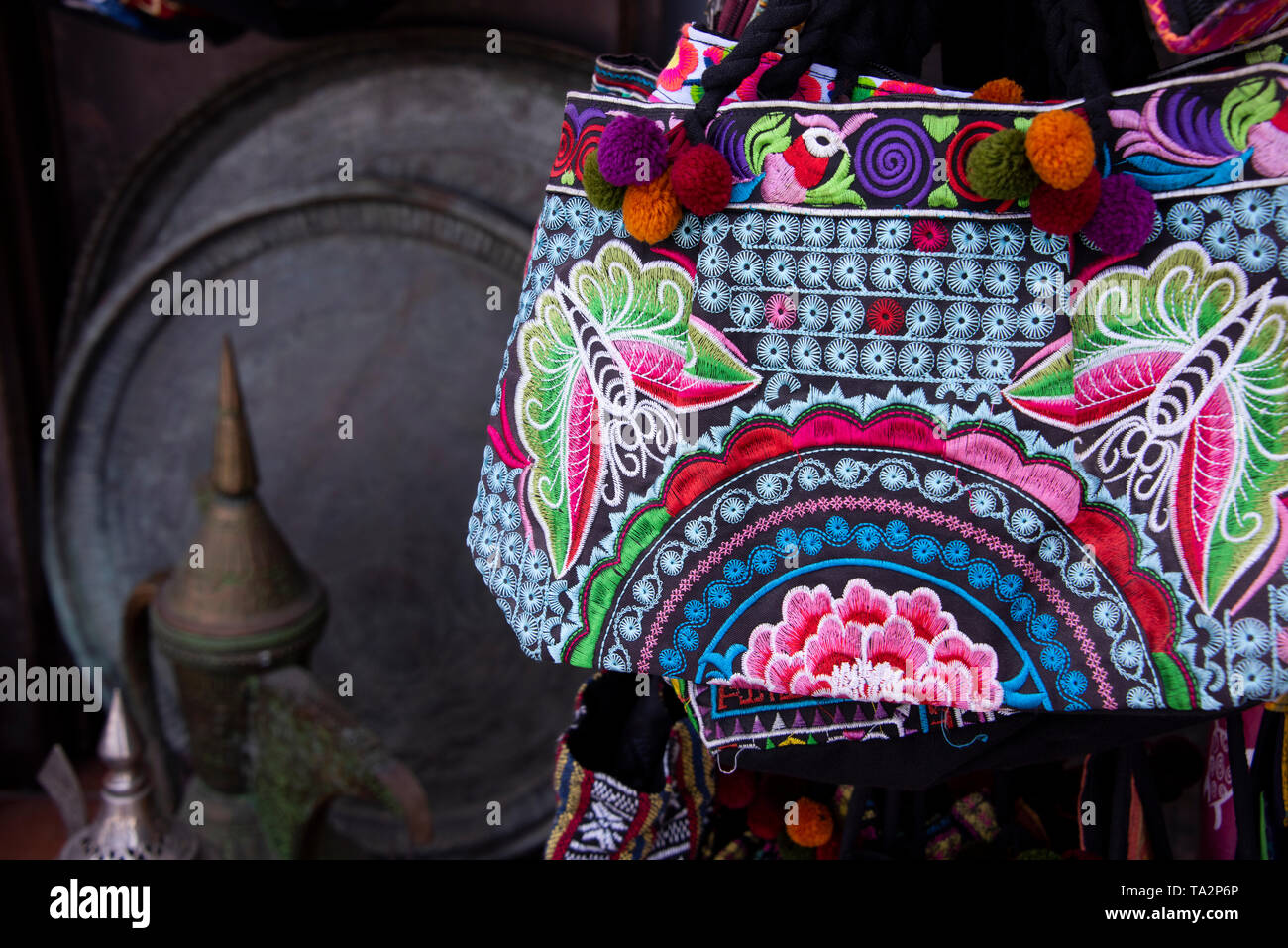 Oman, capital city of Muscat, Muttrah Souk. Typical embroider textile ...