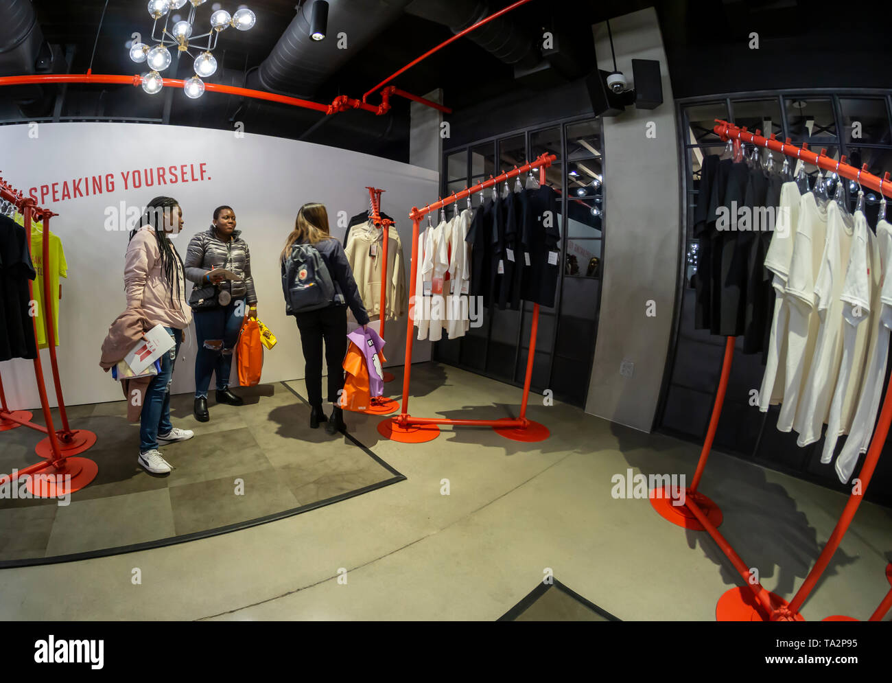 Fans of the Koran K-Pop band BTS shop for band â€œmerchâ€ at a pop-up ...