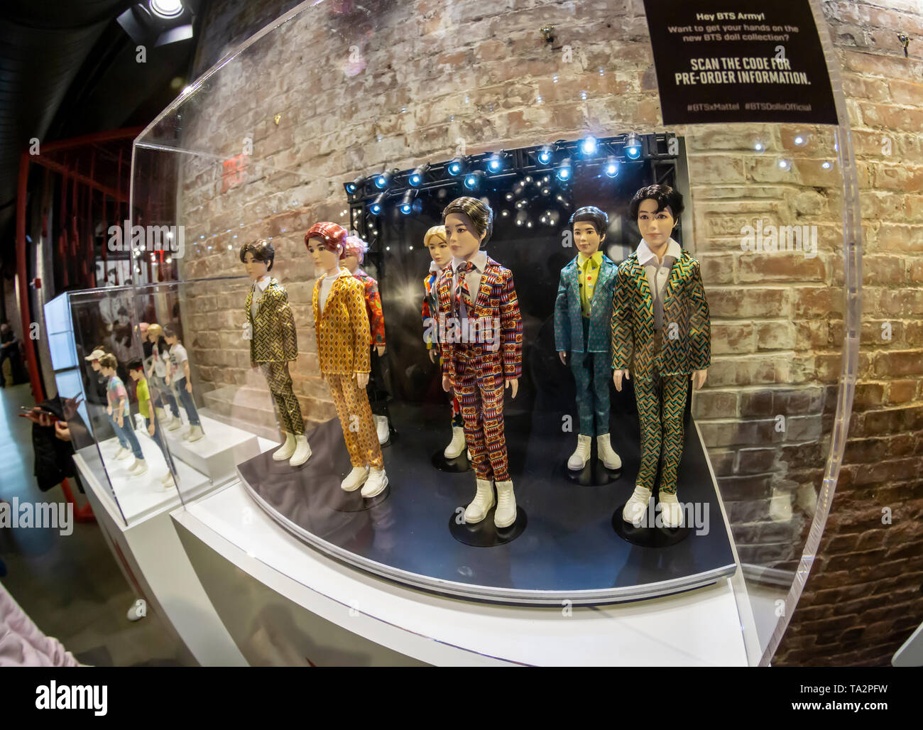 Fans of the Koran K-Pop band BTS shop for band â€œmerchâ€ at a pop-up ...