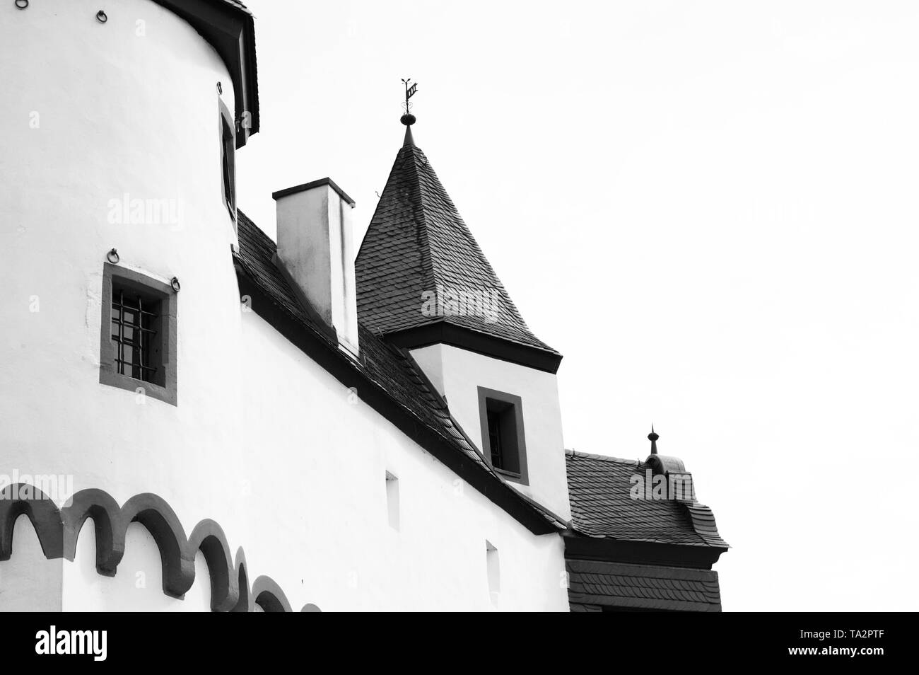 Detail of a white medieval castle with a black roof (Germany, Europe ...