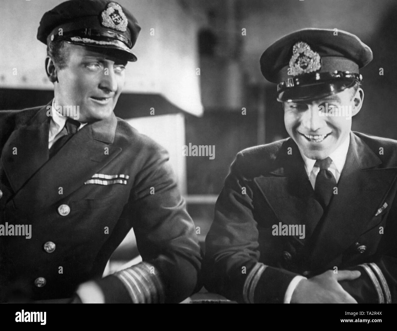 Hans Albers as Captain Craddock (left) and Heinz Ruehmann as first ...