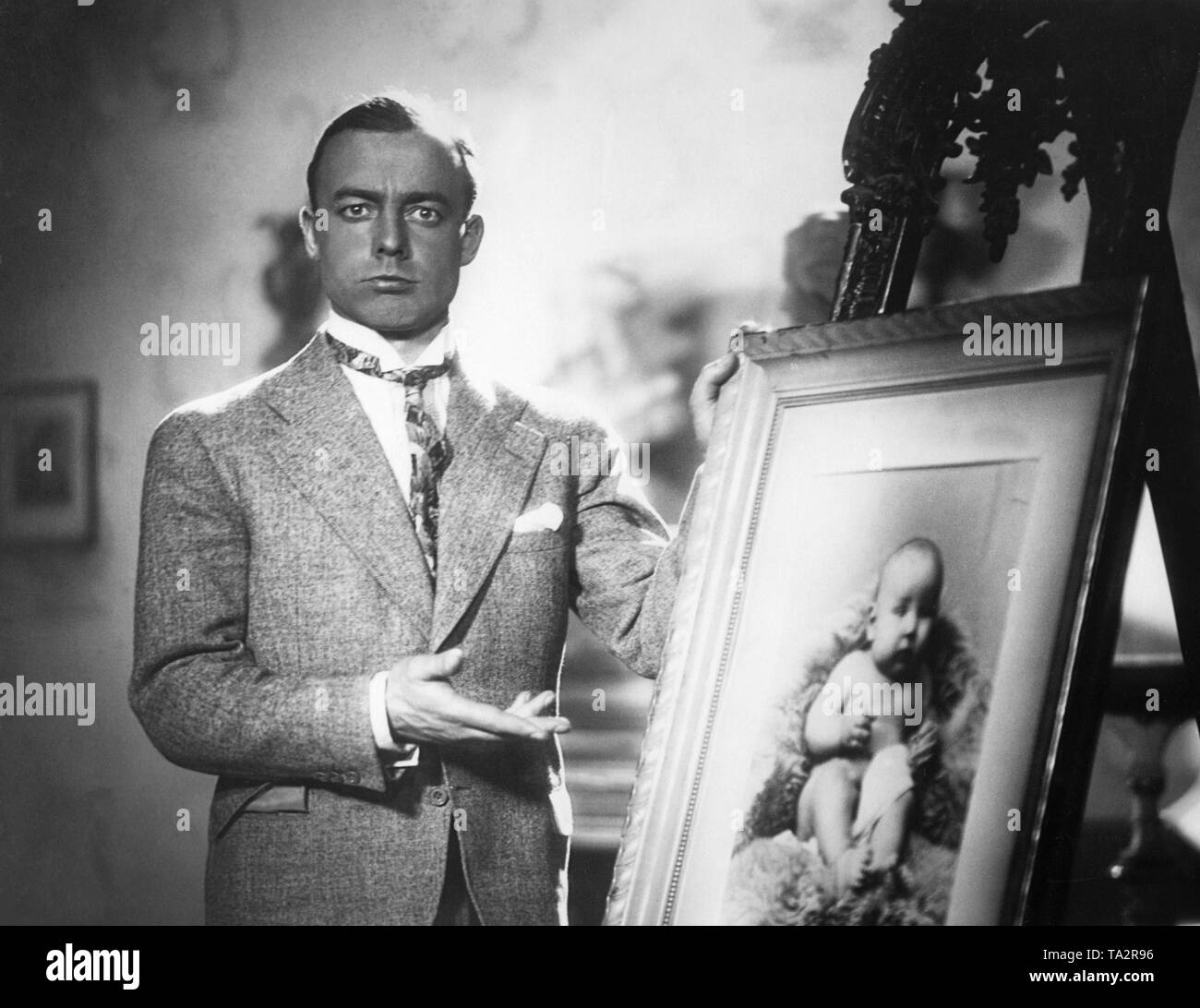 Actor Heinz Ruehmann during a movie scene Stock Photo - Alamy