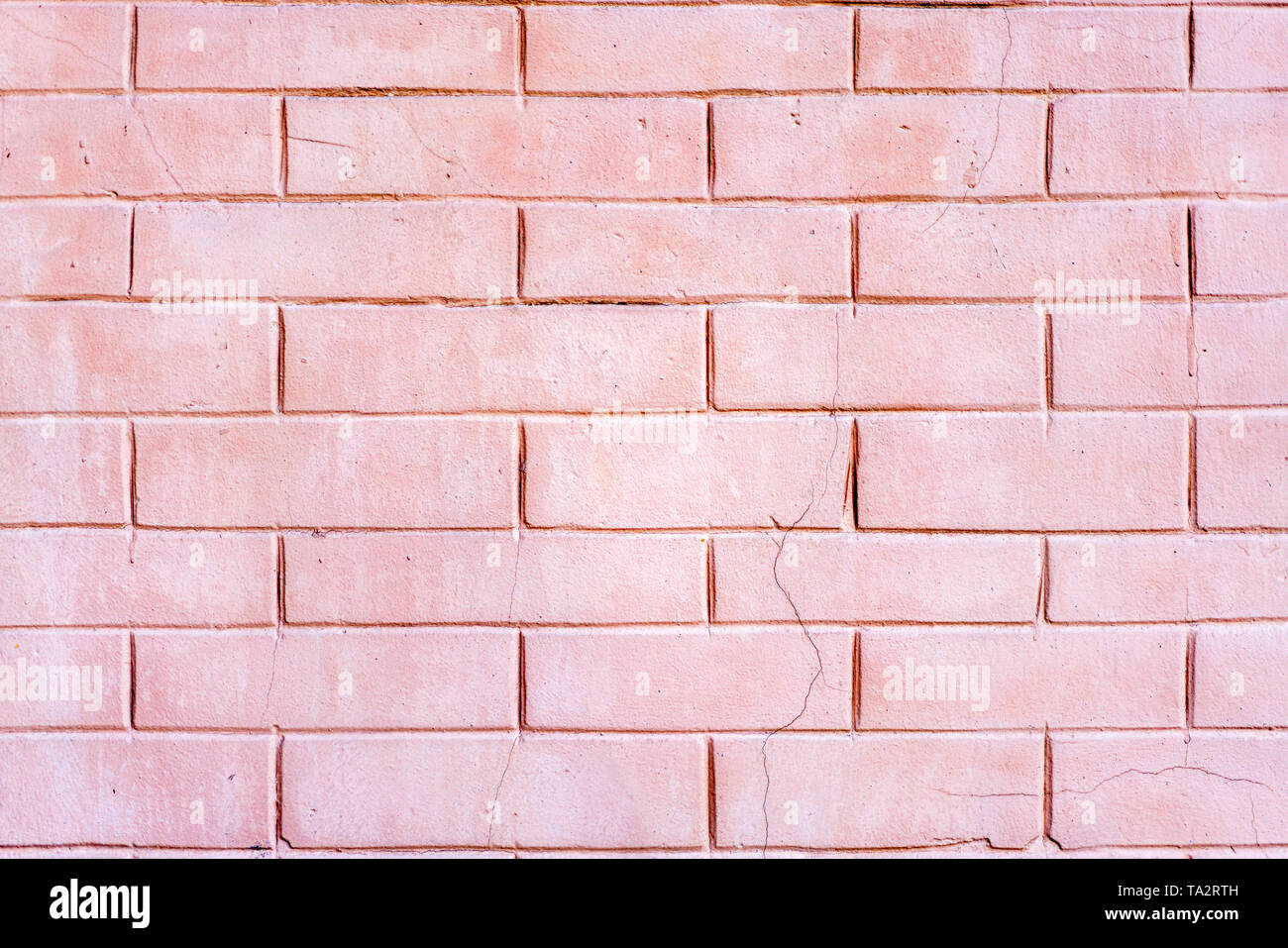 Decorative wall imitating light pink brick Stock Photo - Alamy