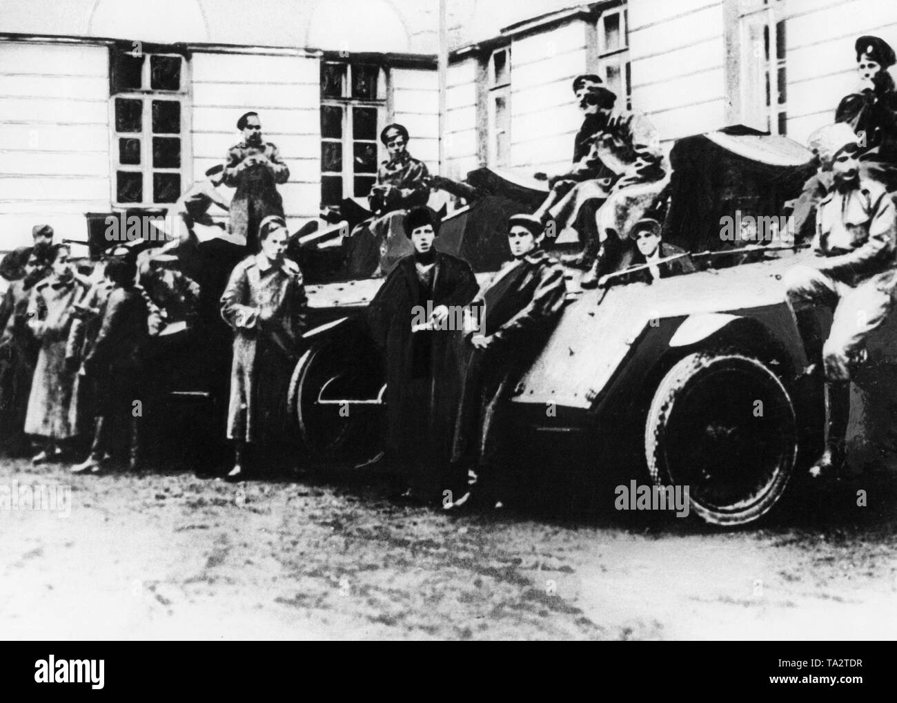 Armored cars and their crews parked for the personal protection of ...
