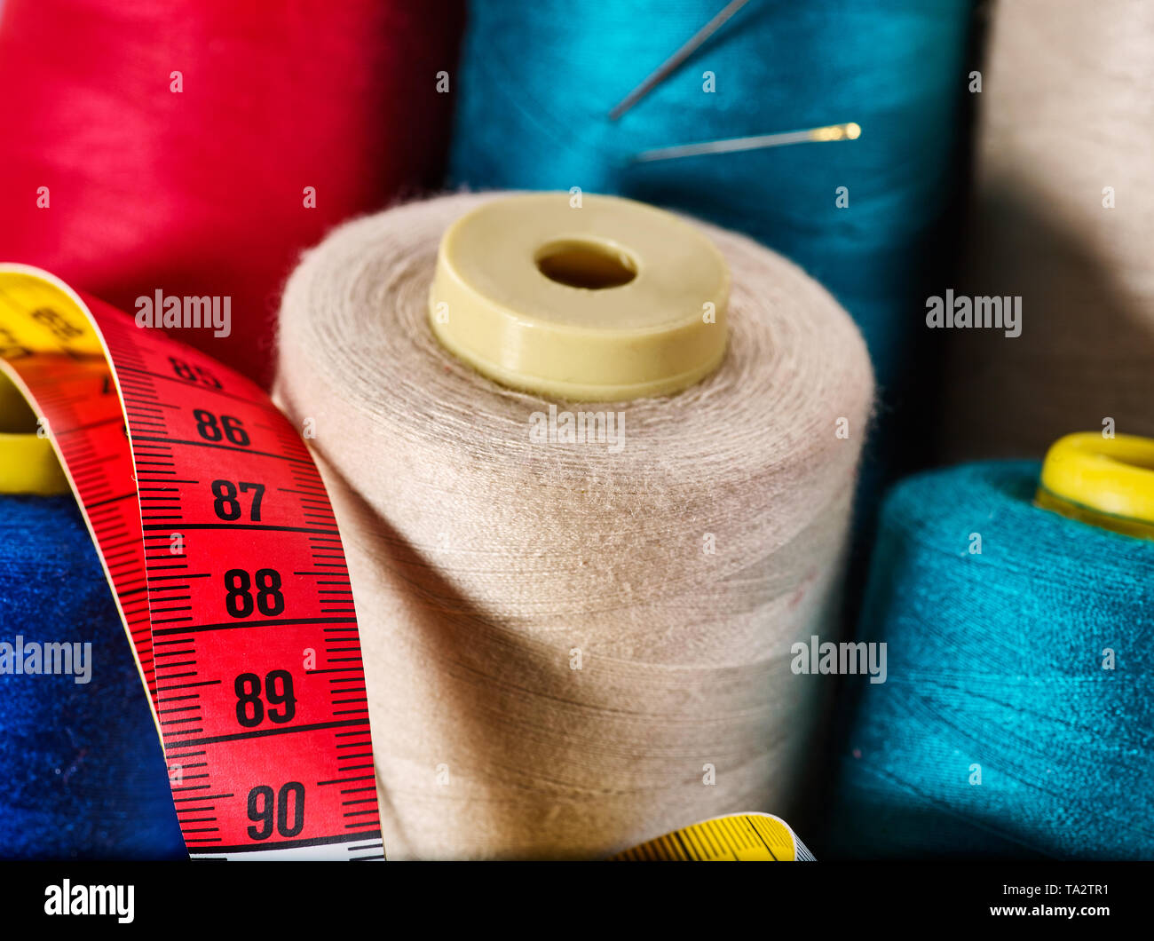 Coil Threads and measuring tape Stock Photo - Alamy