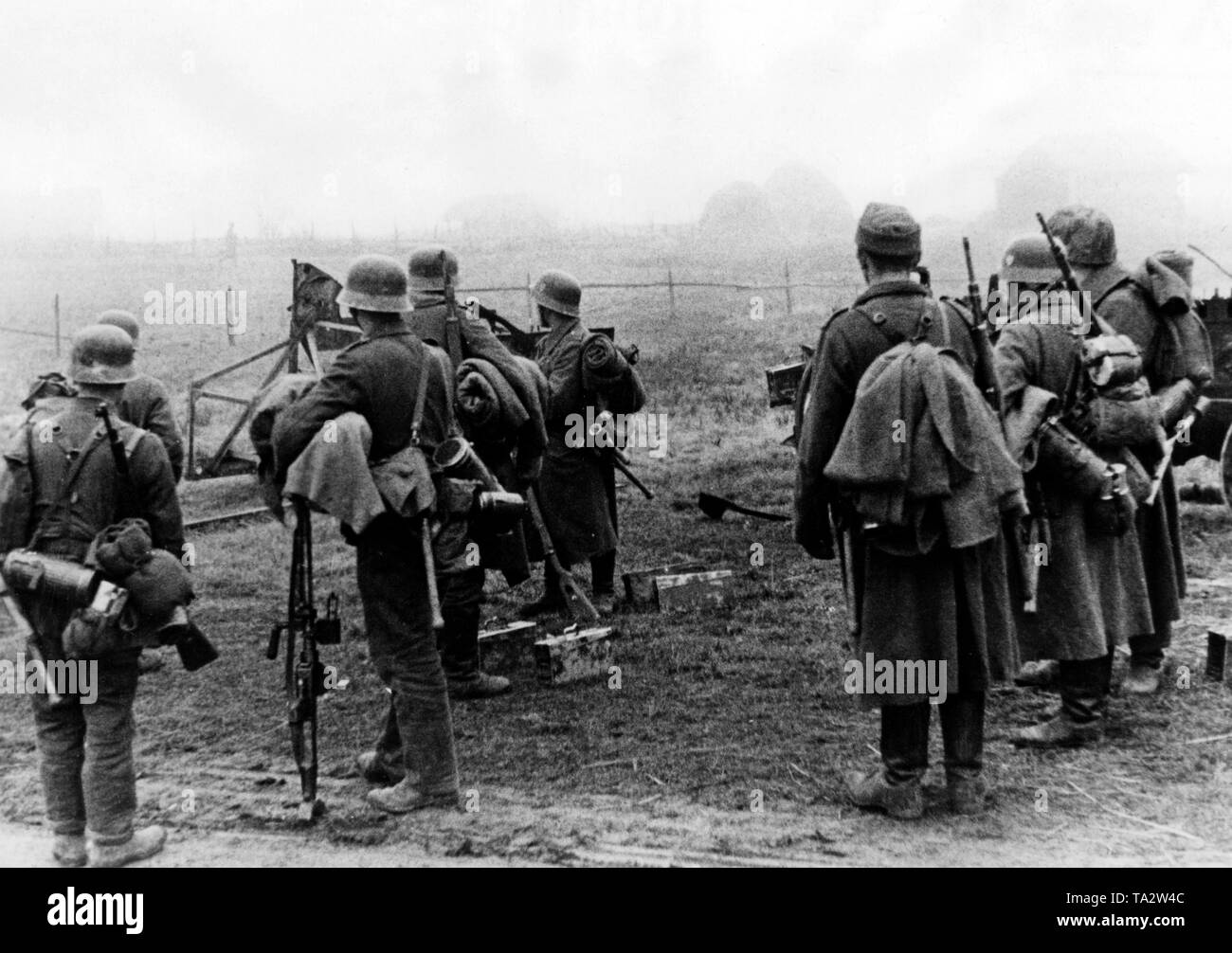 A group of German soldiers are talking in a field in the Newel area. A ...