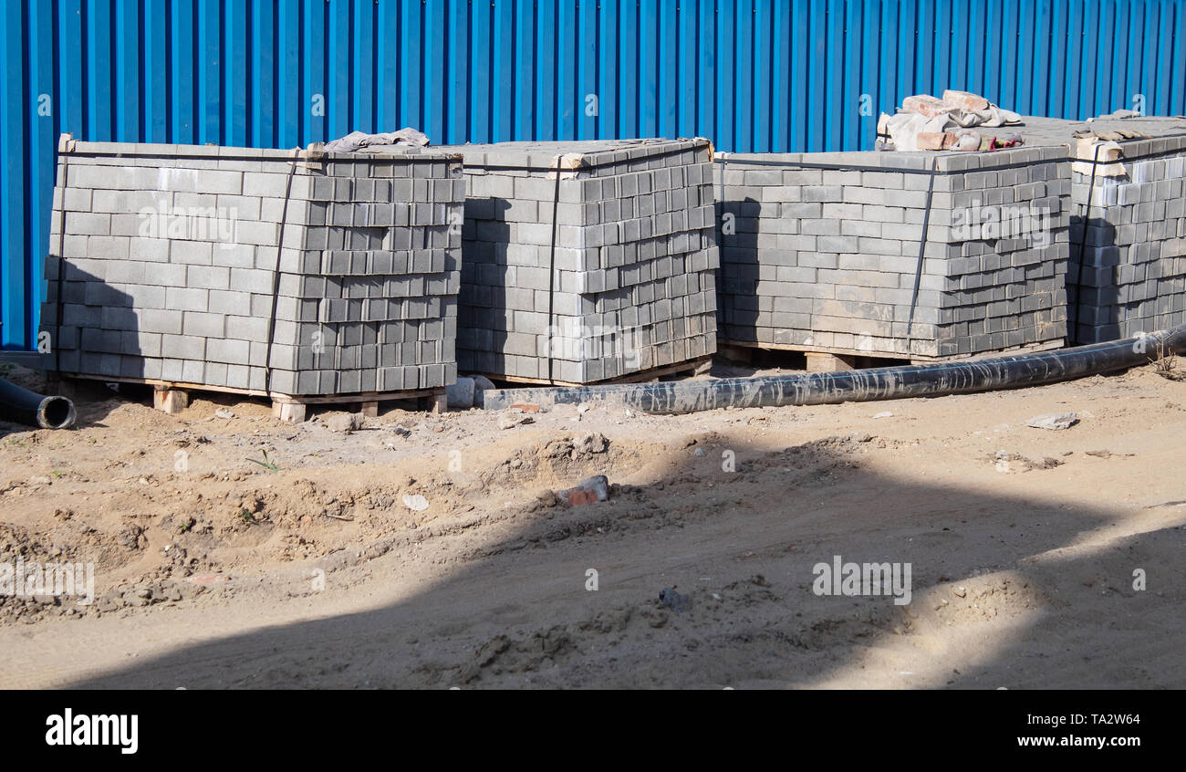 paving slabs packed in the stack prepared for laying outdoor closeup ...
