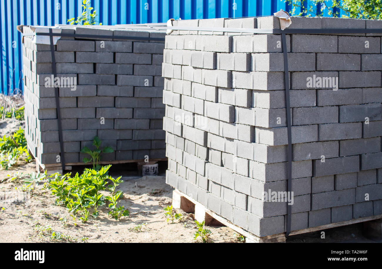 paving slabs packed in the stack prepared for laying outdoor closeup ...
