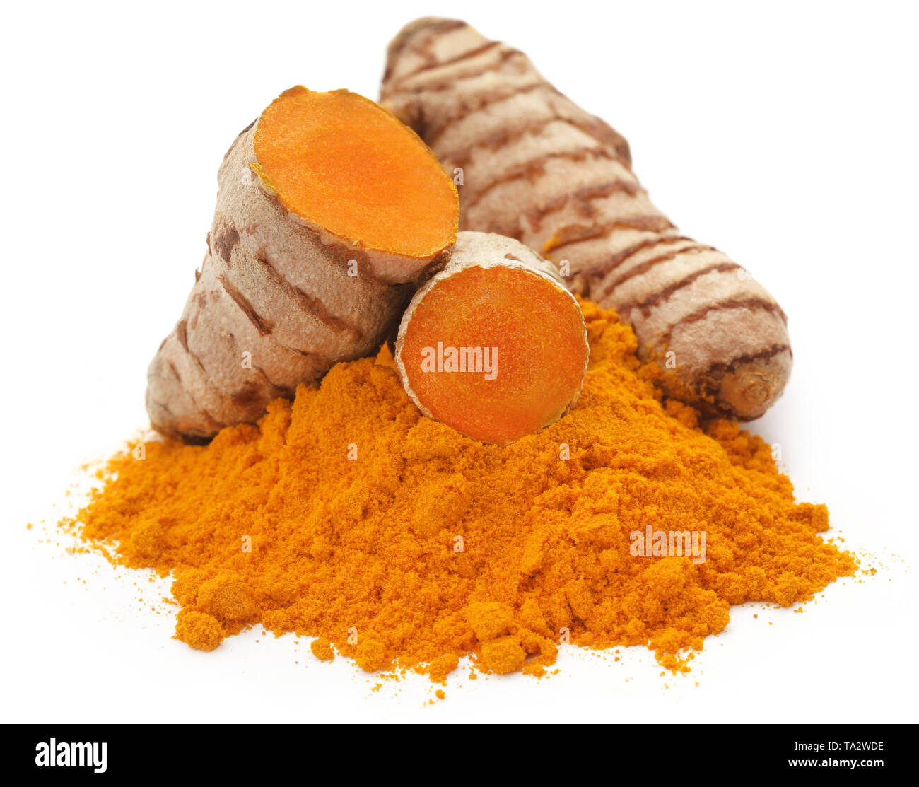 Raw turmeric with powder over white background Stock Photo - Alamy